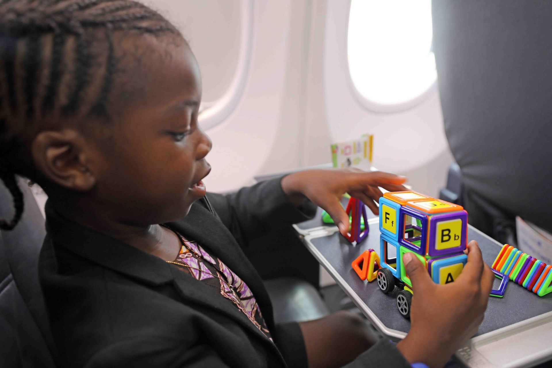 How to survive a flight with a child of every age - The Points Guy
