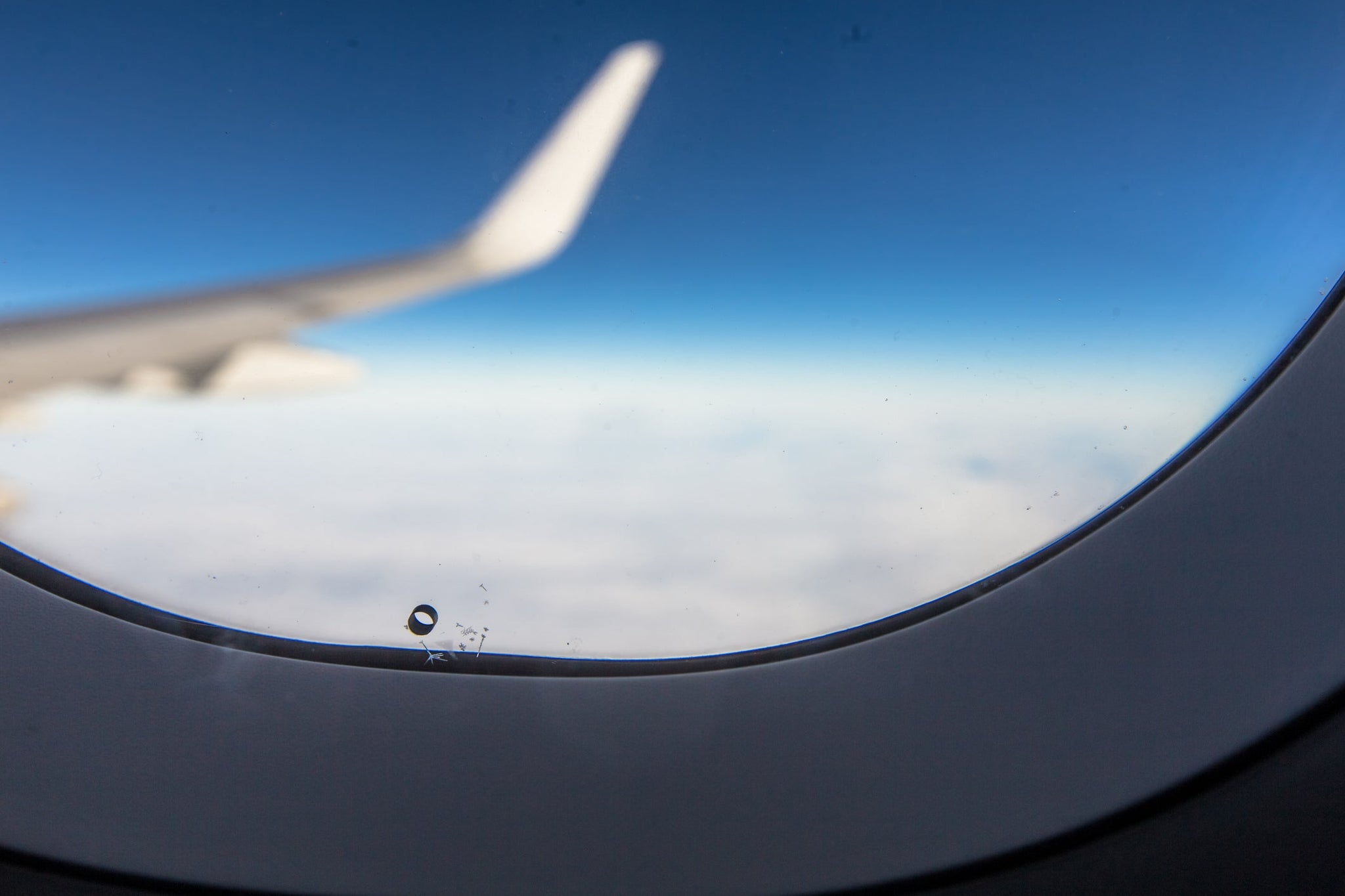 What Are Airplane Windows Made of? - The Points Guy