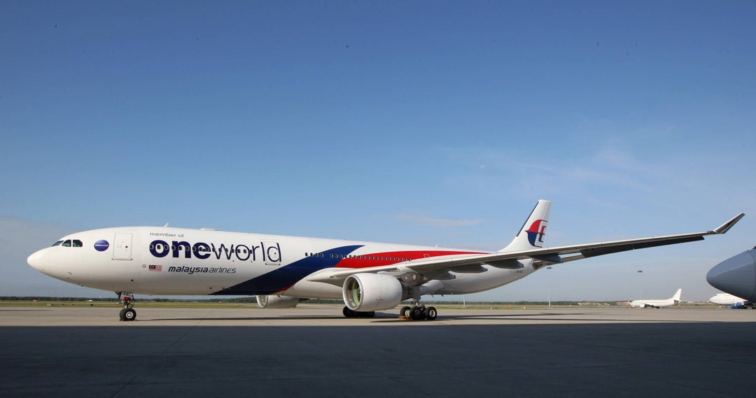 Buying miles to extend Oneworld Sapphire status - The Points Guy