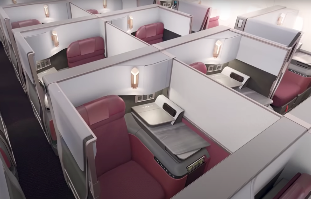 After 3-month delay, Japan Airlines unveils flights on new flagship jet ...
